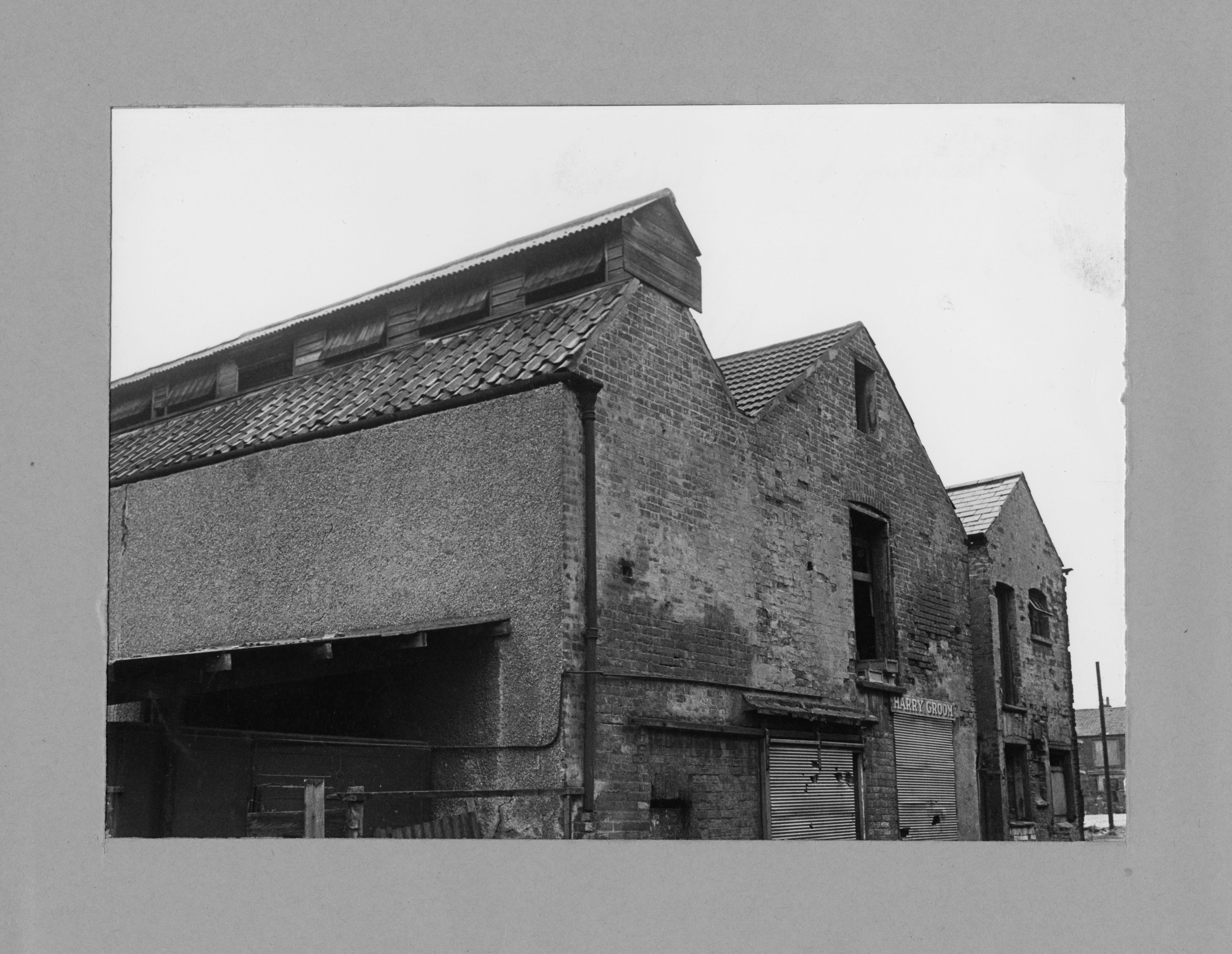 A black and white image of the exterior of the Lowestoft curing house ...